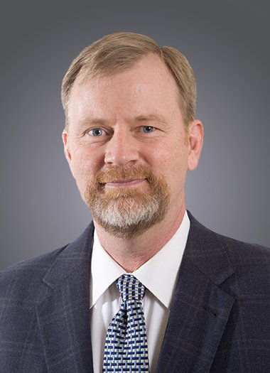 Attorney John E. Carlson | Howry, Breen & Herman, LLP